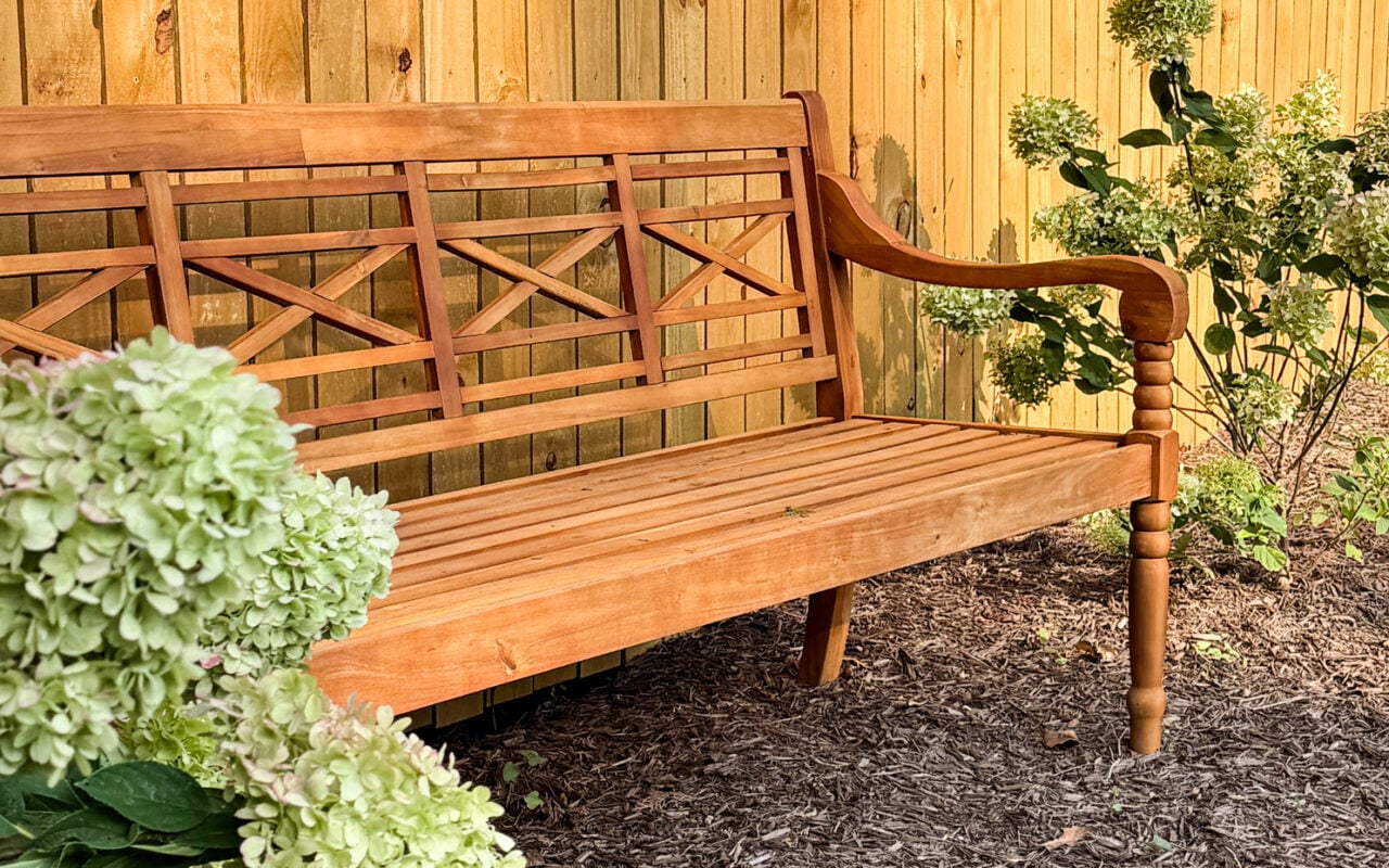 a bench, a fountain, and garden lights | Miss Mustard Seed